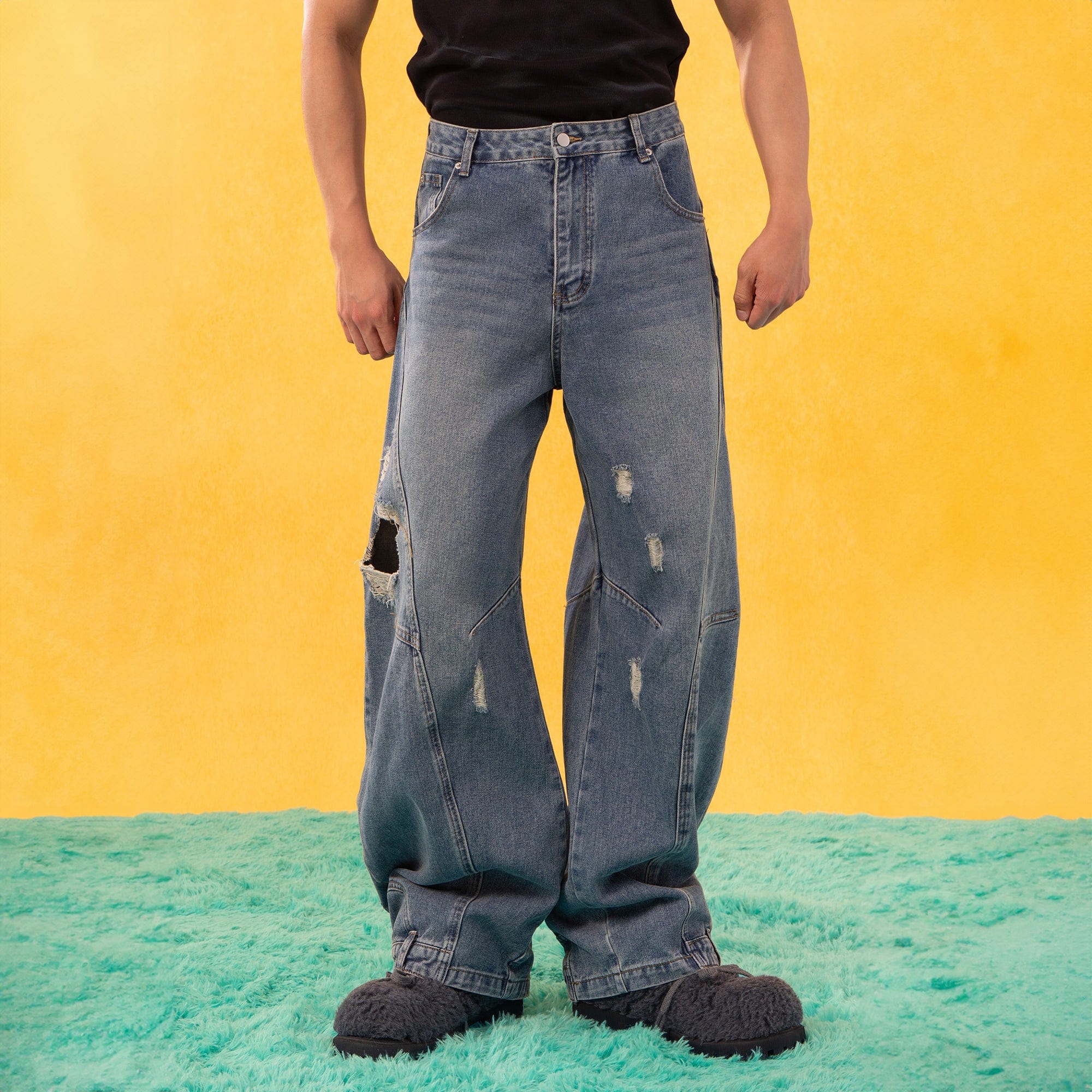 CLP Inverted-Waist Hem Paneled Distressed Jeans