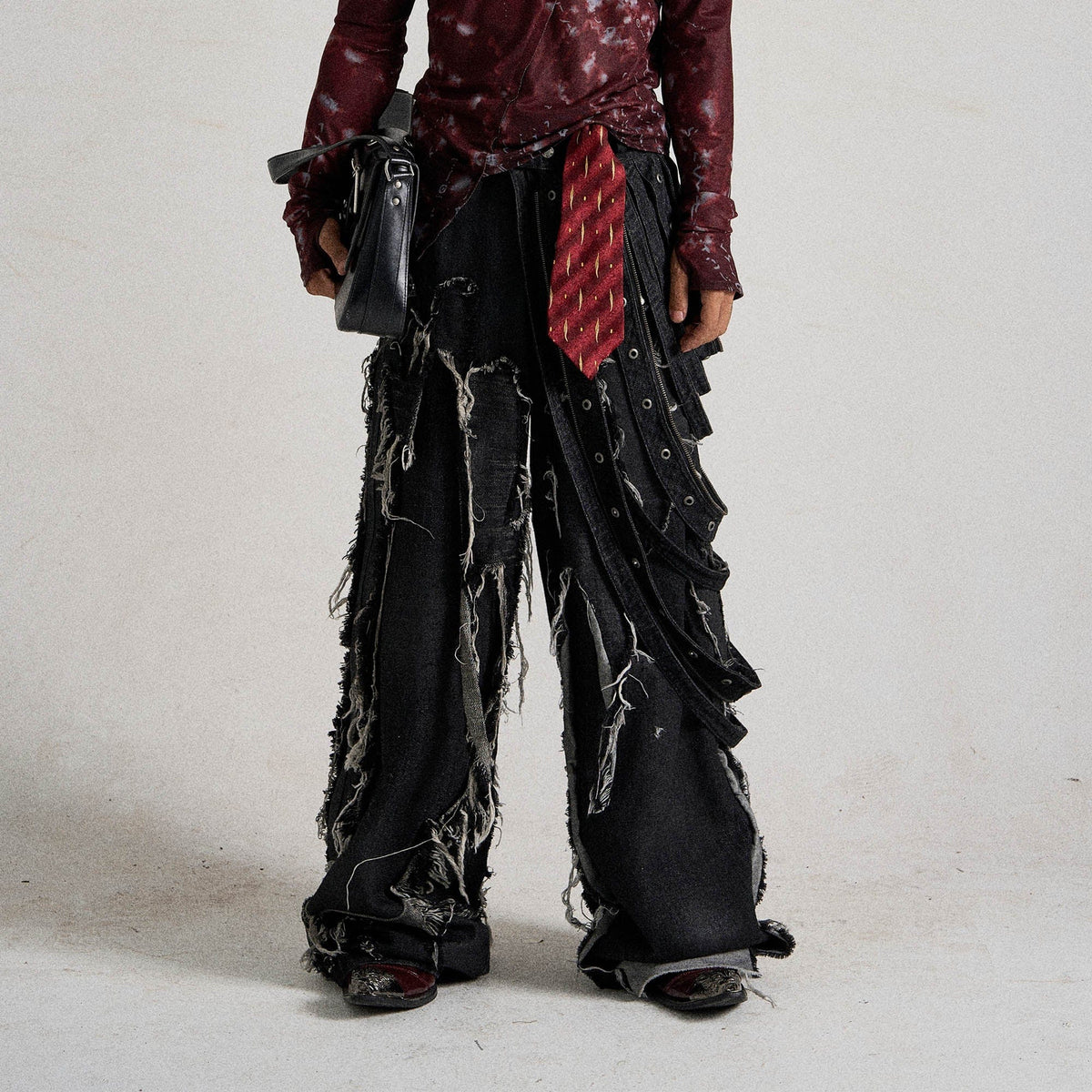 FLYERRER Heavily Frayed Layered Strap Jeans